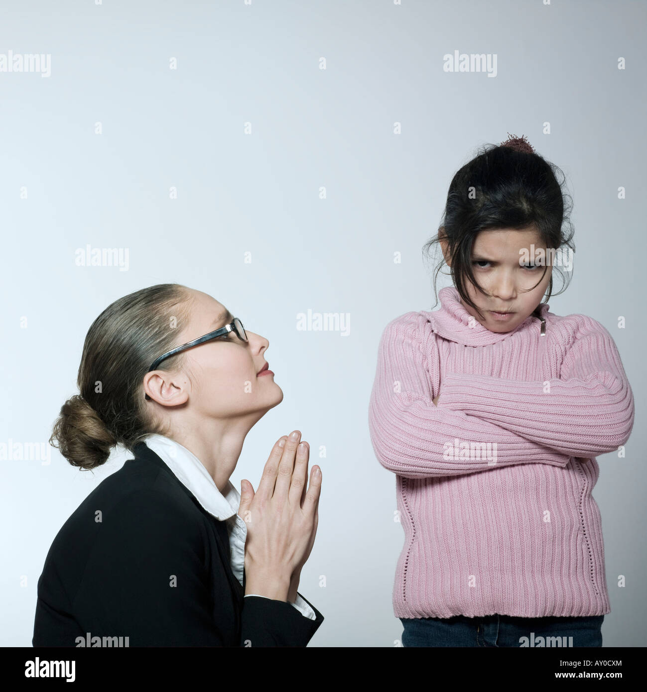 Woman begging woman begging with her child hi-res stock photography and ...