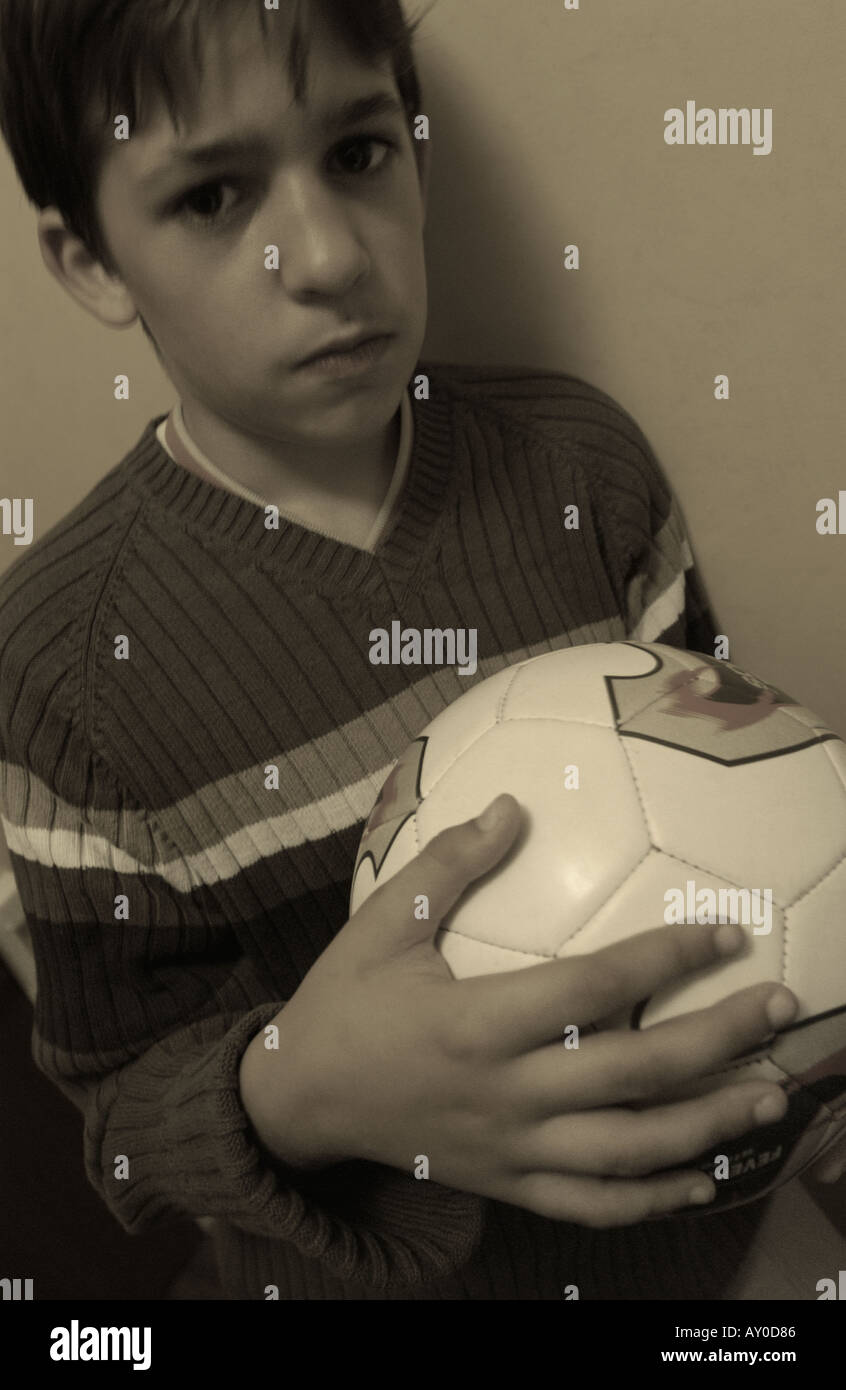 portrait young boy kid ball soccer football look eye camera Stock Photo ...