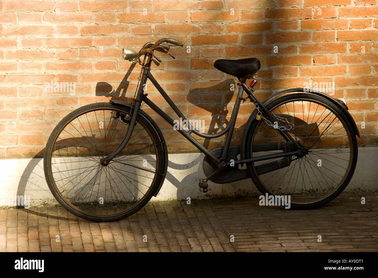 bicycle, leaning, wall, tile, stone, floor, handlebars, wheels, seat ...