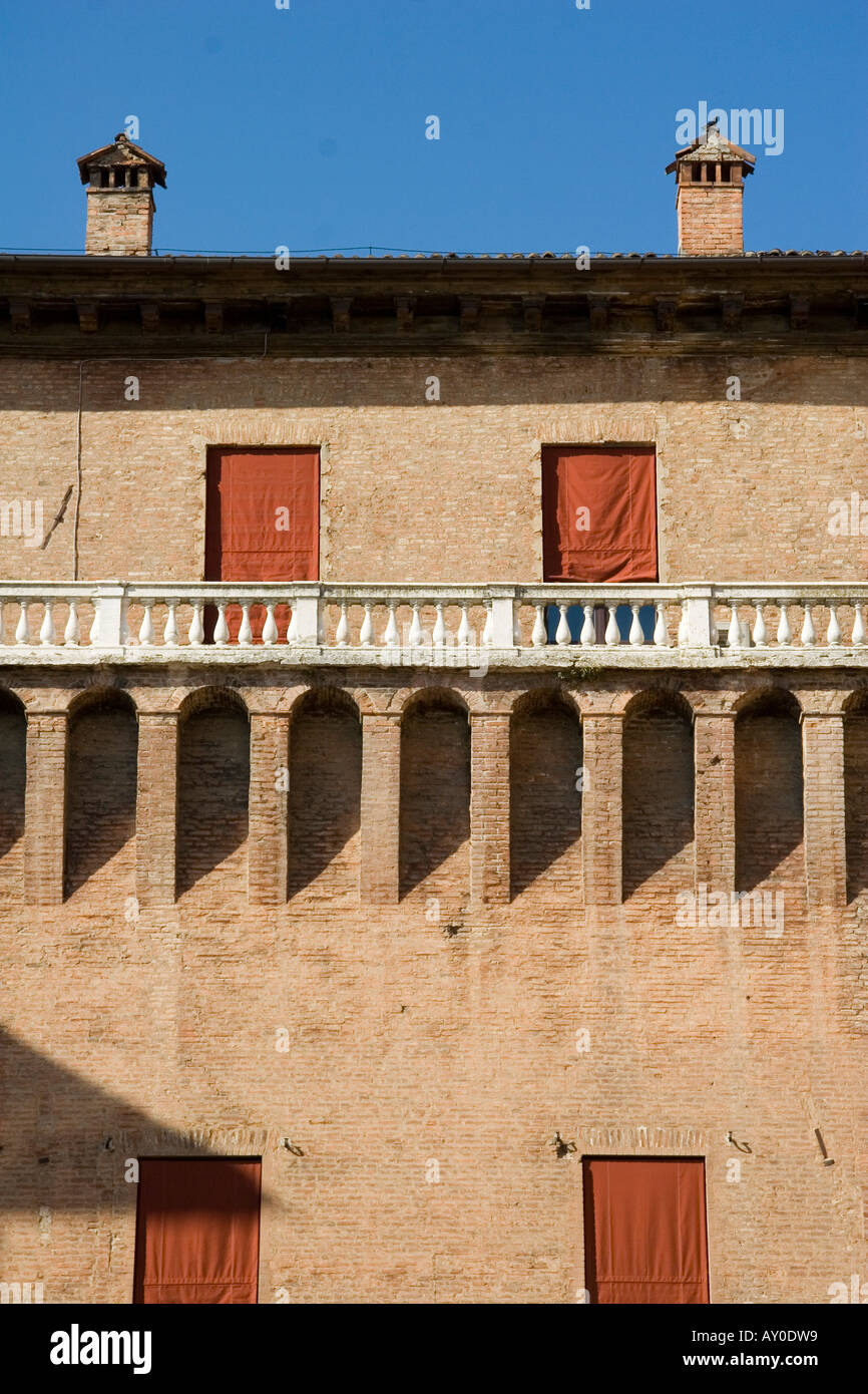 ferrara castle este italy europe medieval arcade close up red window ...