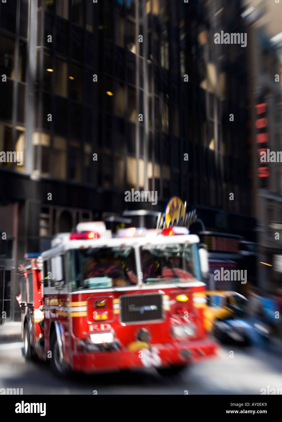 A New York fire engine answering a 911 emergency call near Times Square ...