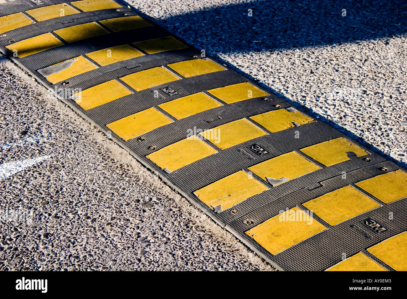 reduce speed bump Stock Photo - Alamy