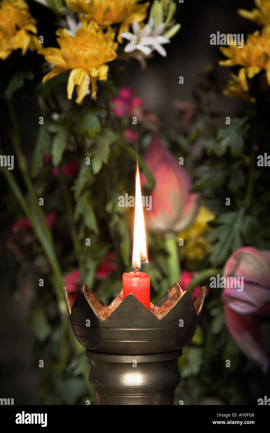 Lit candle in a holy shrine at the Perfume Pagoda temple, Northern ...