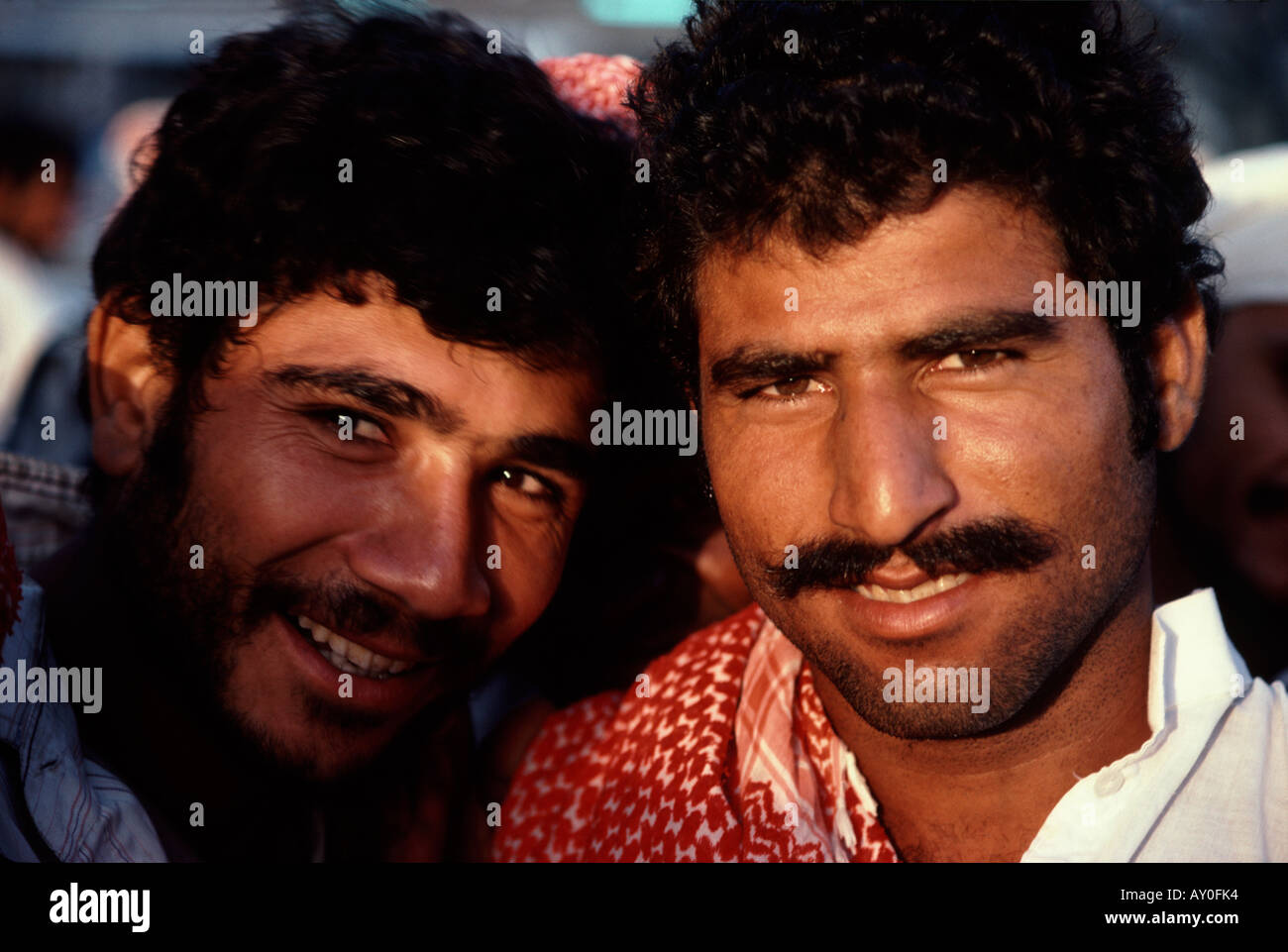 saudi arabian workers smiling at camera in jeddah souk saudi arabia ...