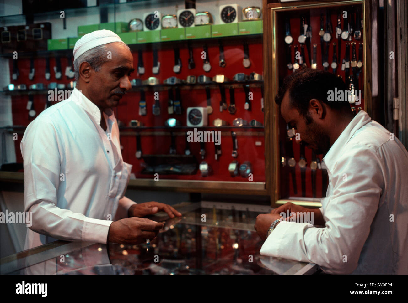 saudi man bartering in shop in the souk in jeddah saudi arabia middle ...