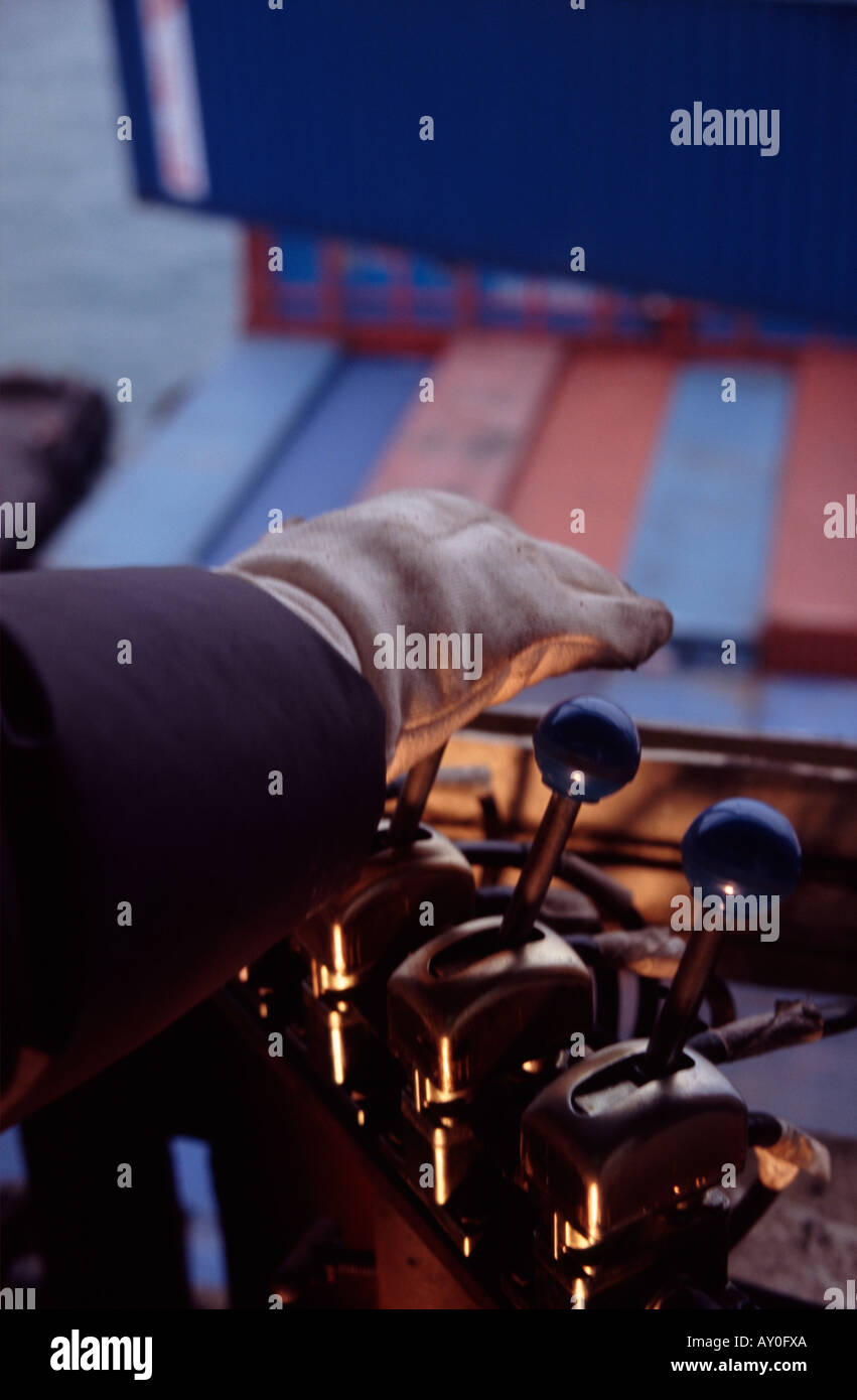 close up of barge handling barge workers hand on levers transferring ...