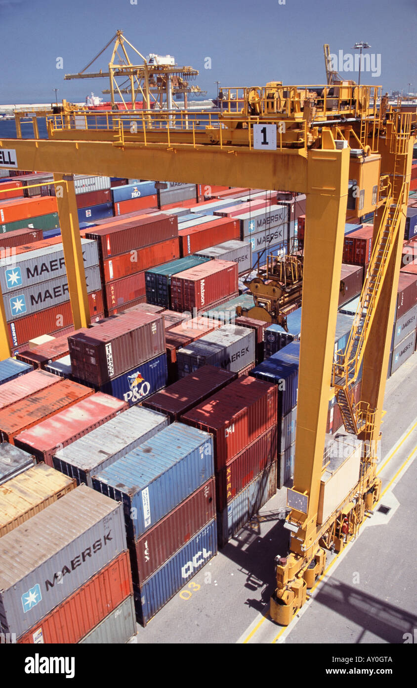 shipping container boxes teu teus in the port stacks with gantry crane ...