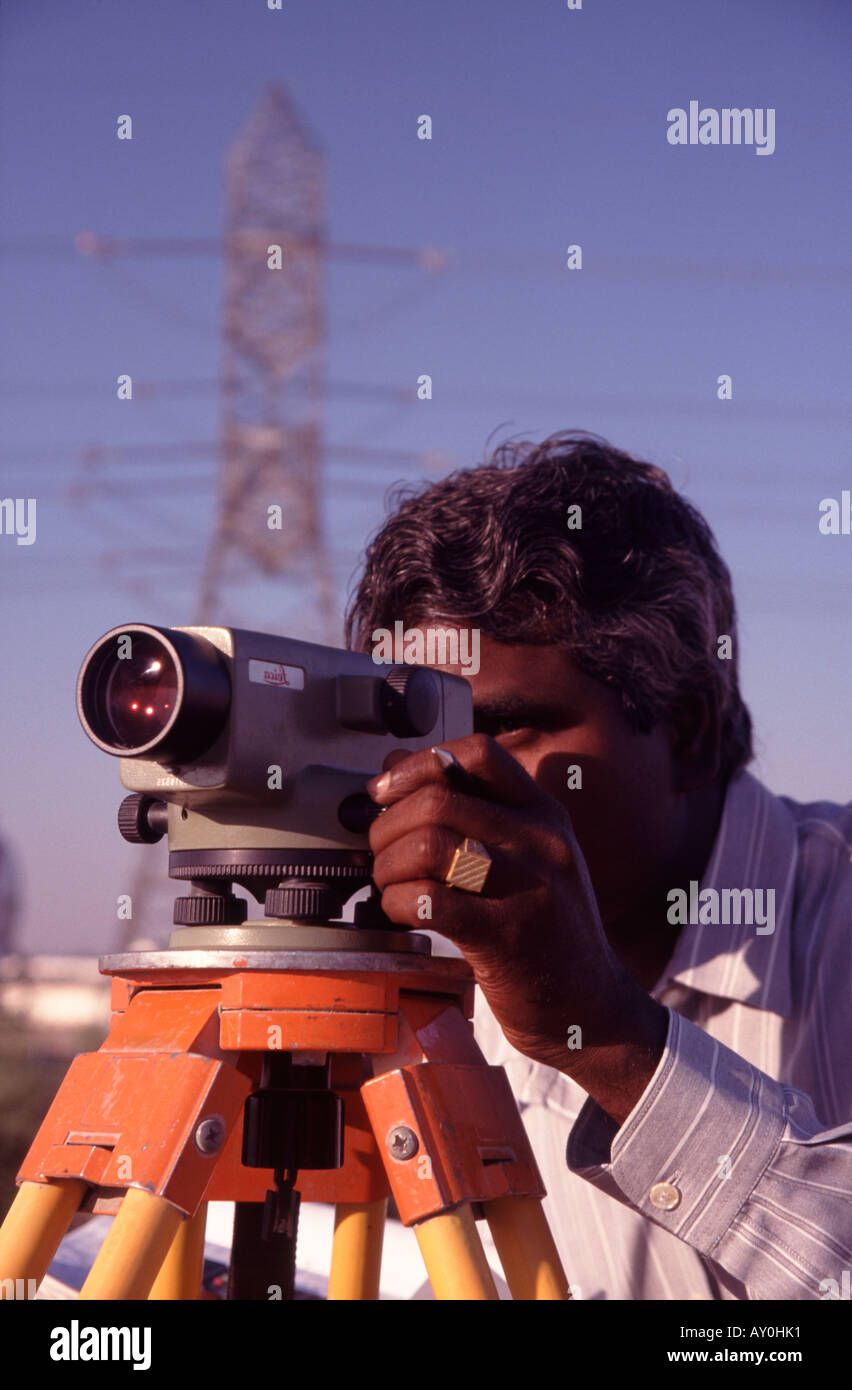 indian construction working taking elevation measurements uae Stock ...