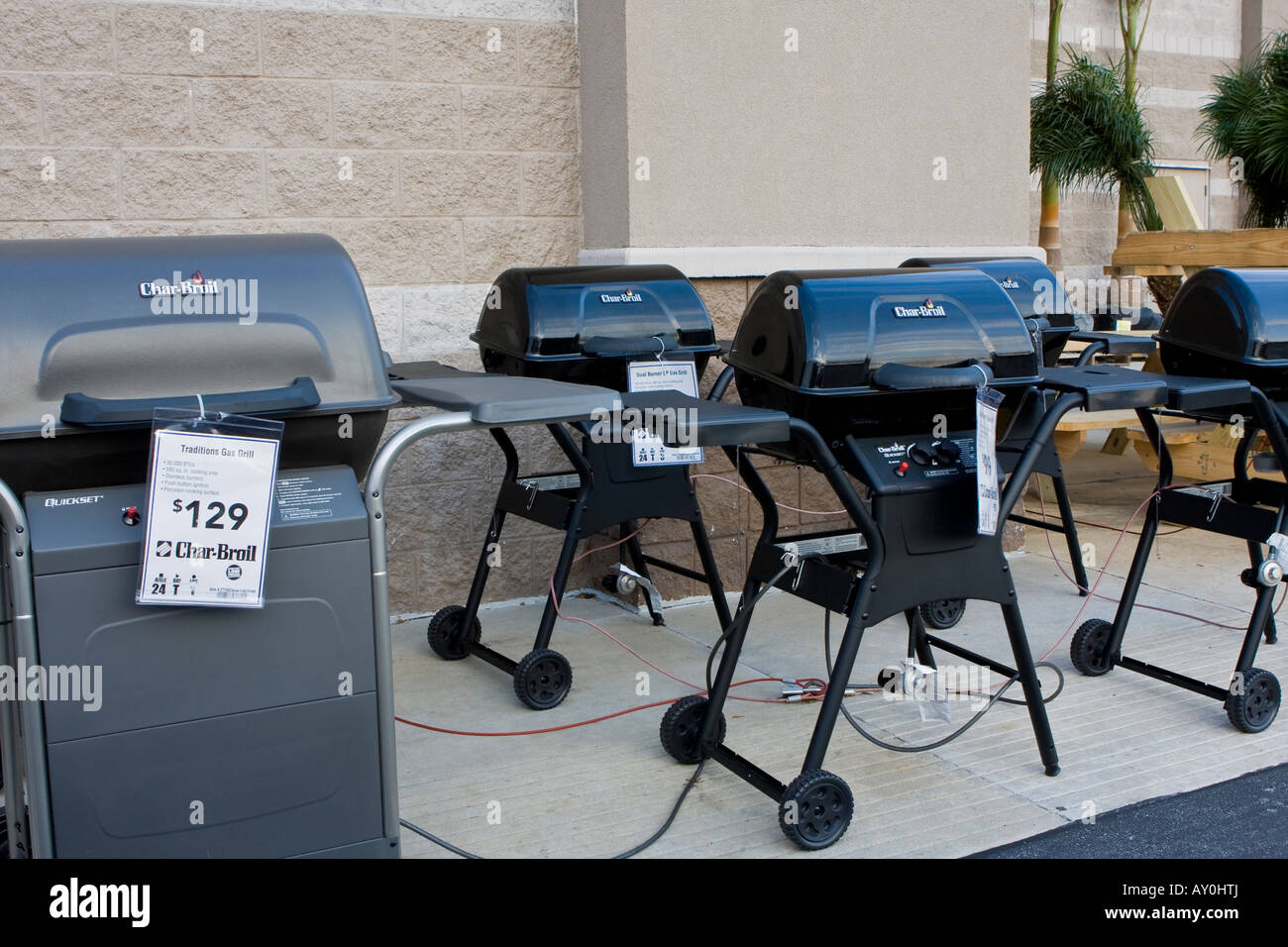 lawn care lawn and garden colorful gas grill cookout Stock Photo - Alamy