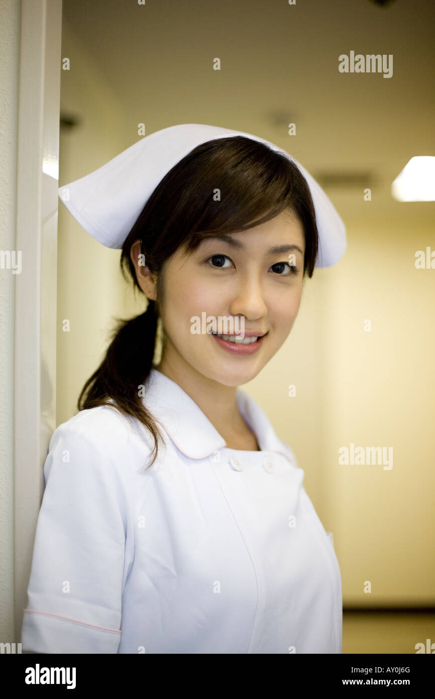 Portrait of smiling nurse Stock Photo - Alamy