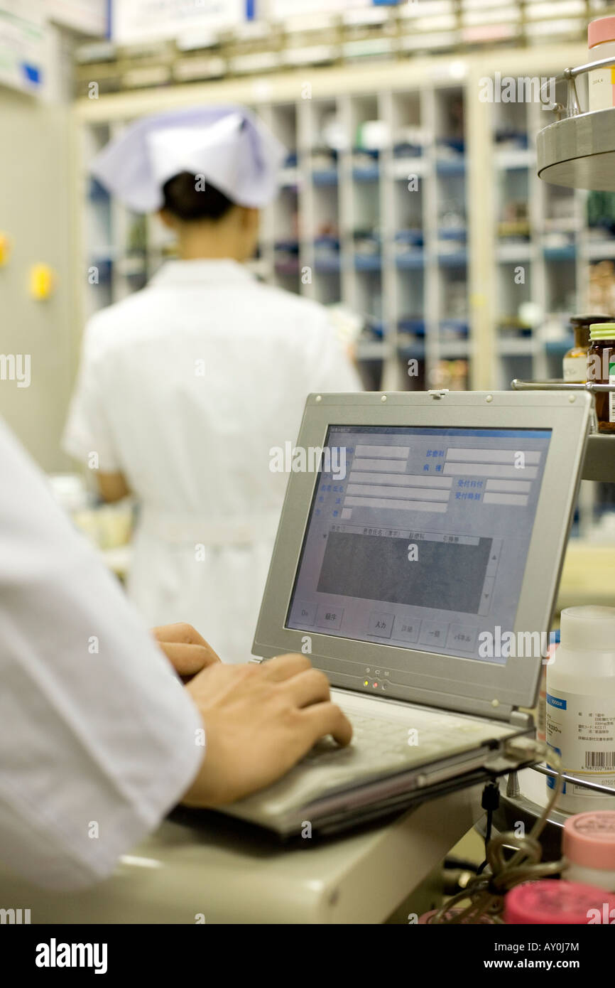Nurse entering data Stock Photo - Alamy