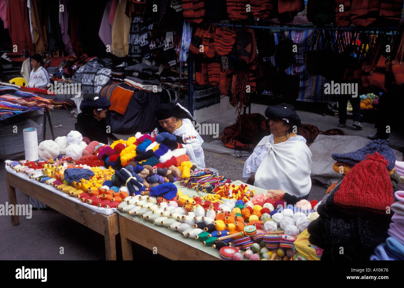Women selling colourful wool and cotton at a stall at the market in ...