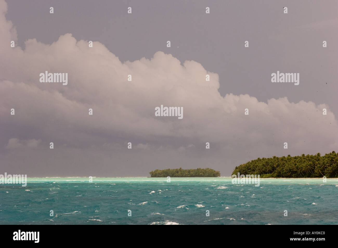 Storm clouds over small islands in Mapia Atoll, West Papua, Indonesia ...