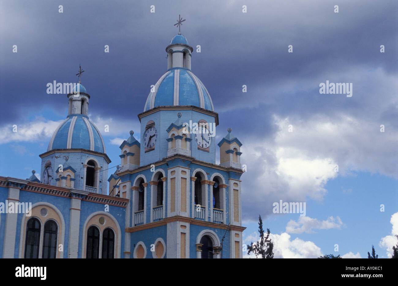 Church clocks showing different time on the church in Malacatos in ...