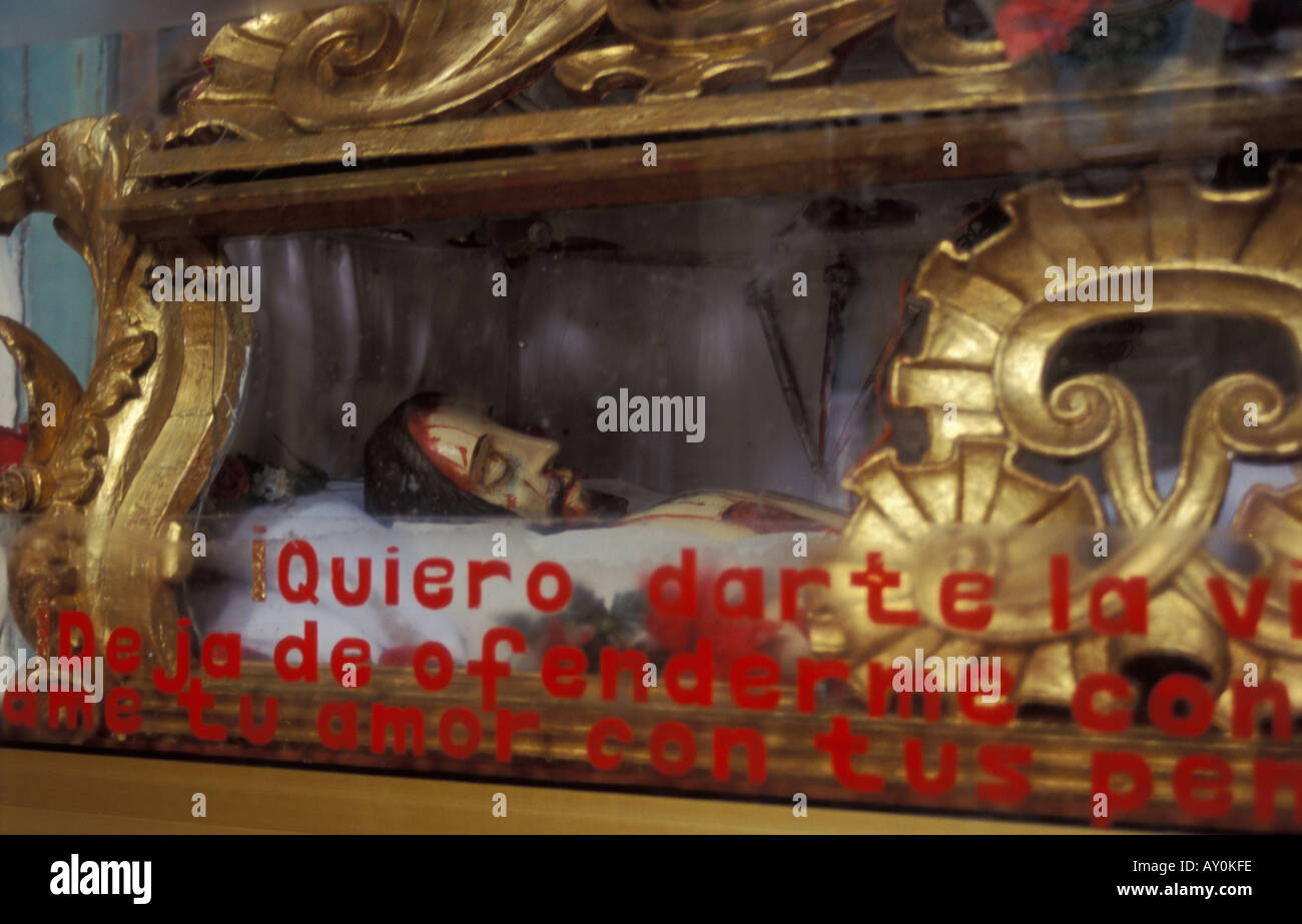 Statue of dead Jesus in glass coffin in a church in Loja Stock Photo ...