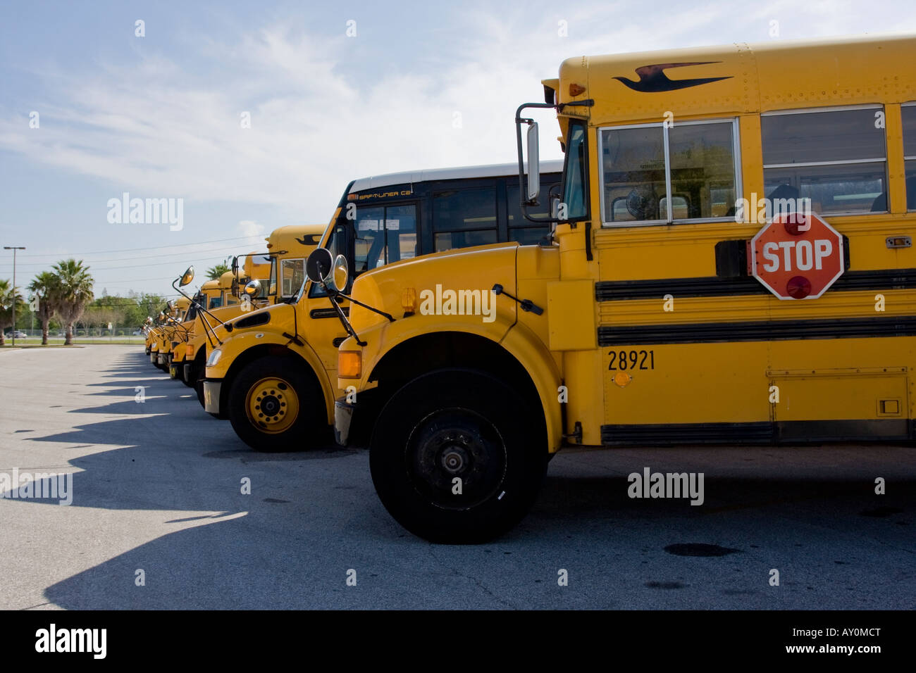 Row of School Buses Stock Photo - Alamy