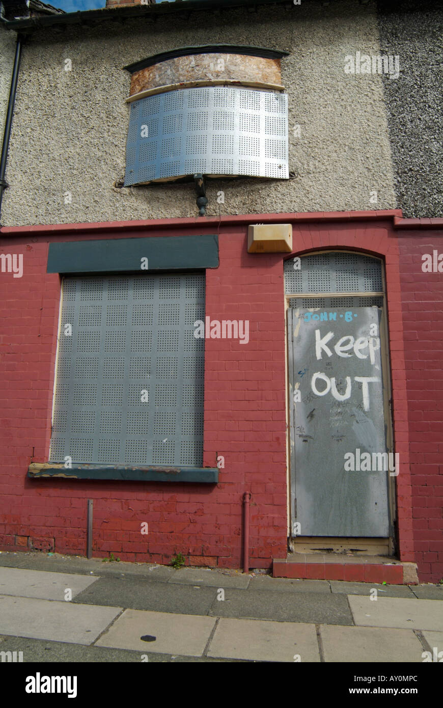 Boarded and secured house ready for demolition or refurbishment in ...