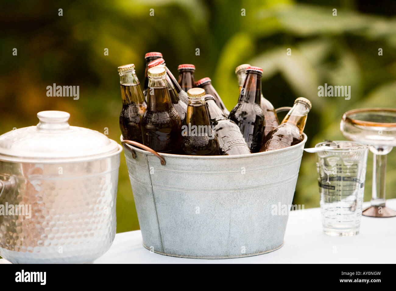 Collection of bottles in bucket Stock Photo - Alamy