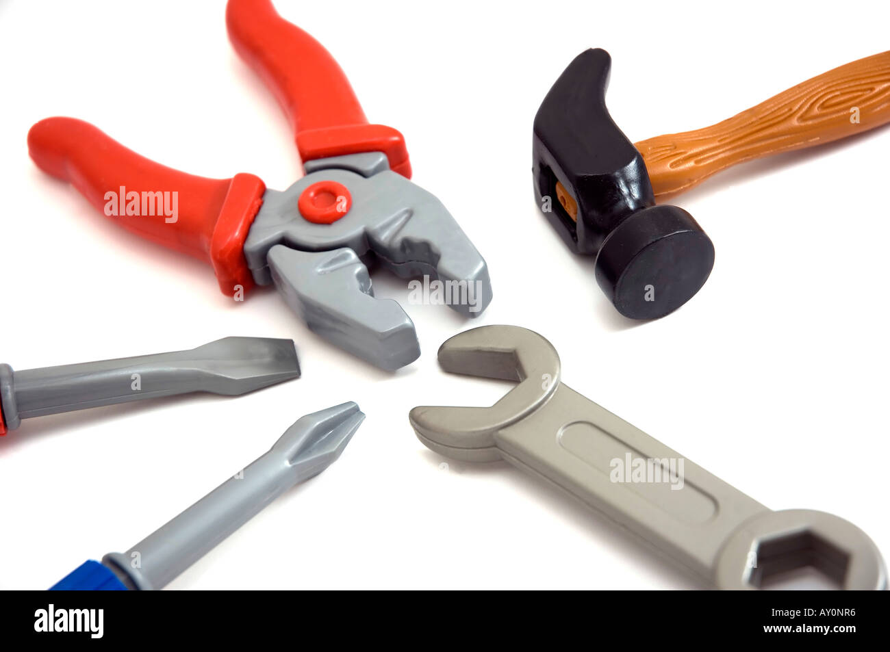 Assorted plastic childrens tools Stock Photo - Alamy