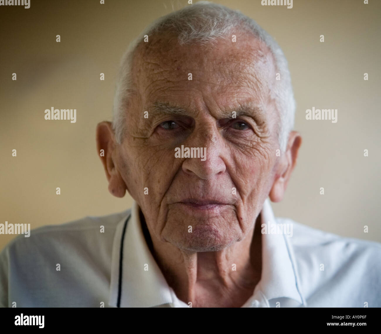 Senior citizen looking somber Stock Photo - Alamy