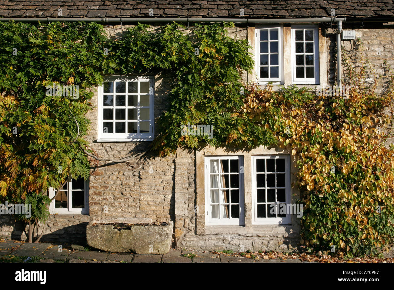 Cottages in the picture postcard village of Castle Combe in Wiltshire ...