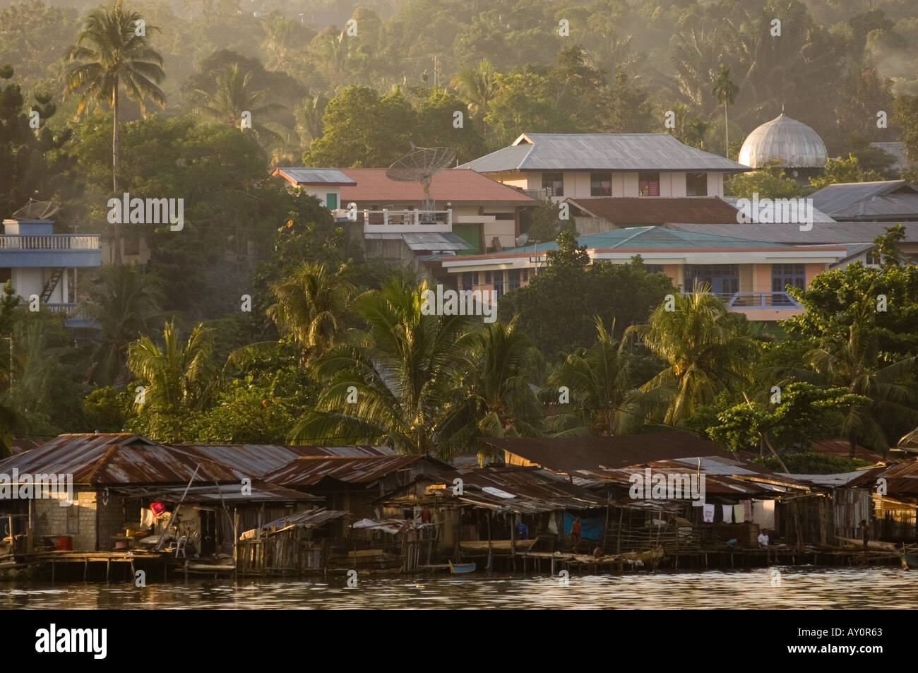 Manokwari harbour at sunset, West Papua, Indonesia Stock Photo - Alamy