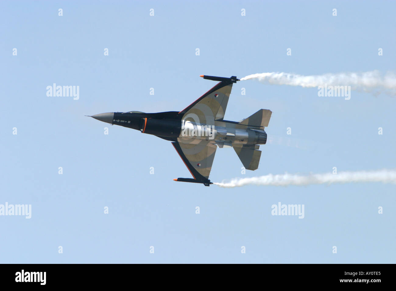 F16 military fighter jet performing an acrobatic display Stock Photo ...