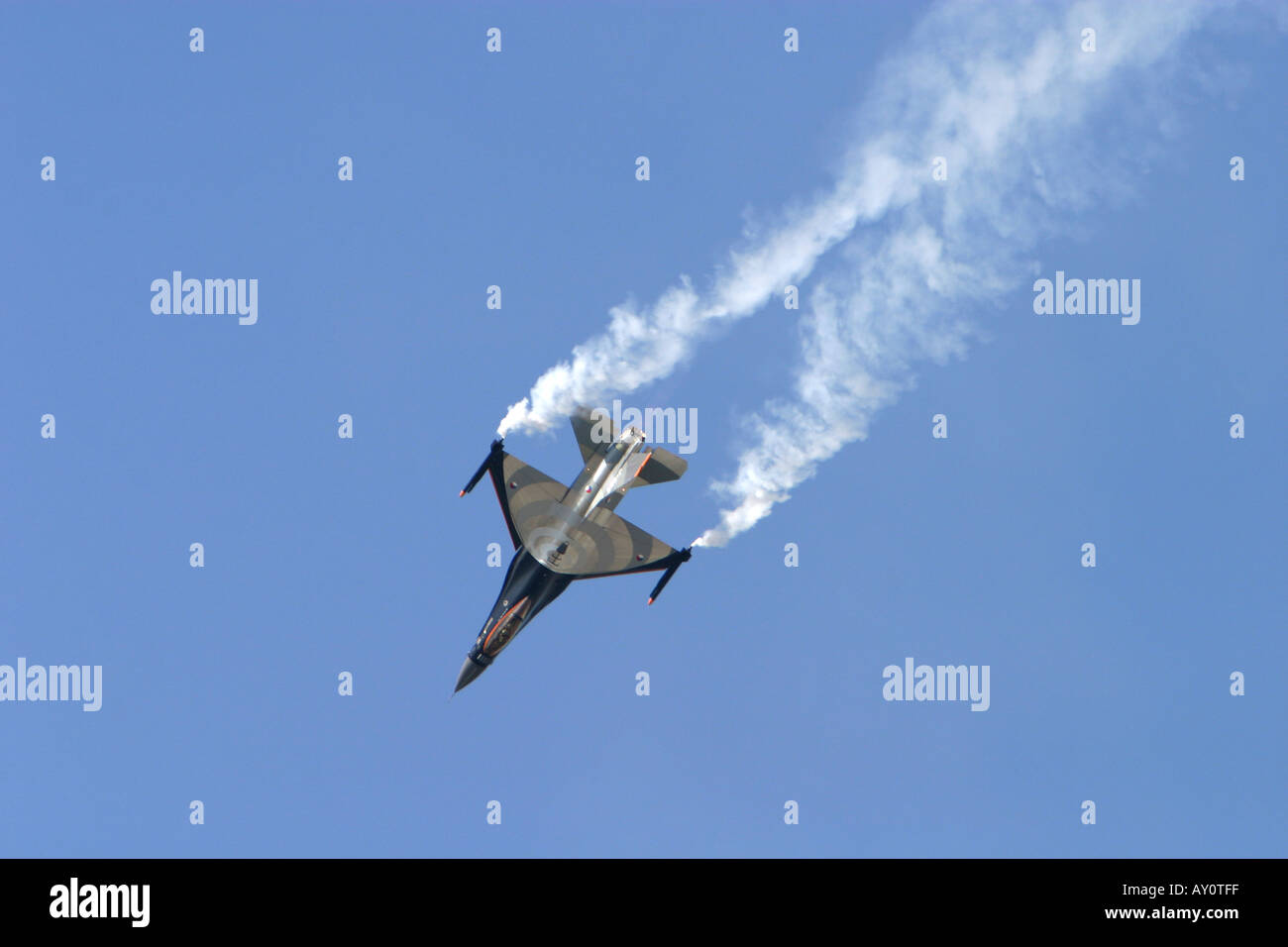F16 military fighter jet performing an acrobatic display Stock Photo ...