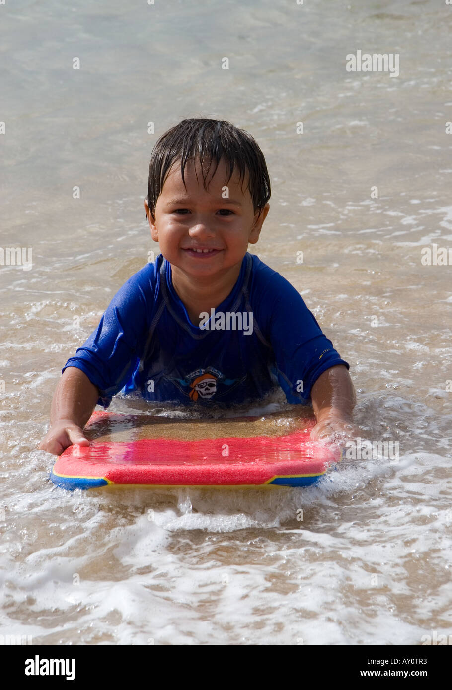 Boy boogie boarding hi-res stock photography and images - Alamy