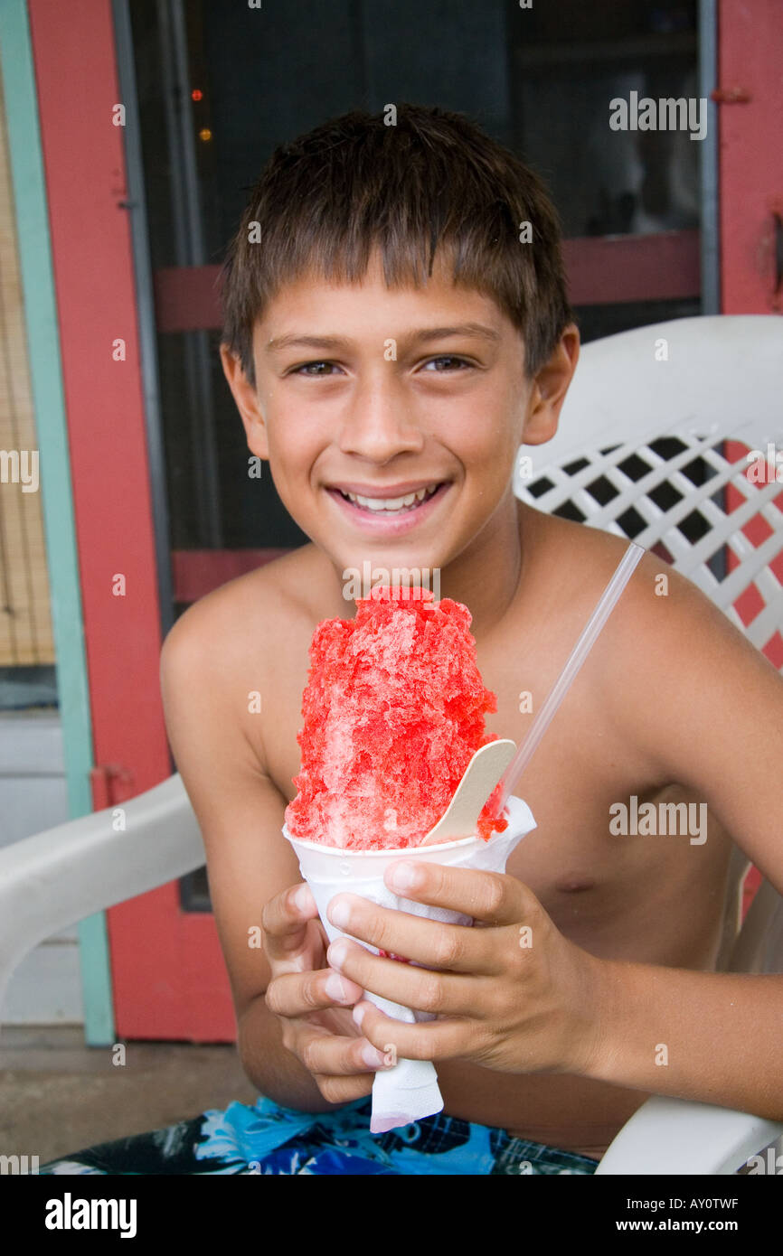 Boy with a shave ice in Hawaii Stock Photo - Alamy