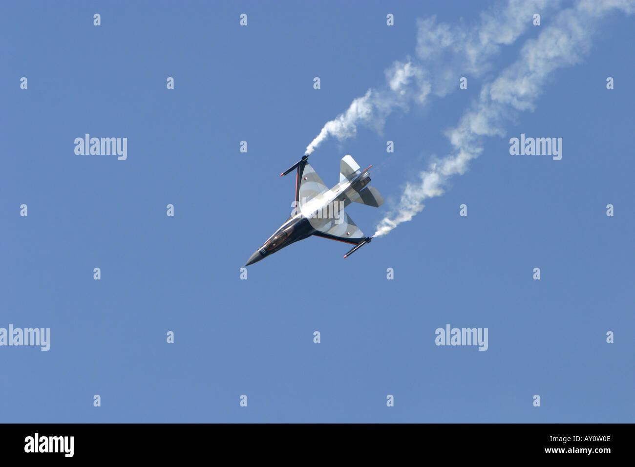 F16 military fighter jet performing an acrobatic display Stock Photo ...