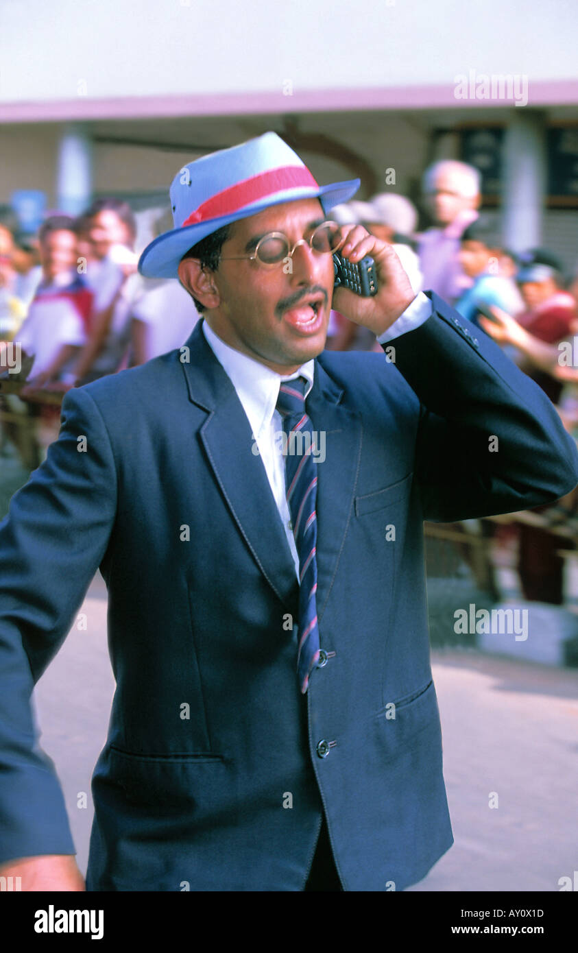 Cell-phone walker talker Stock Photo - Alamy