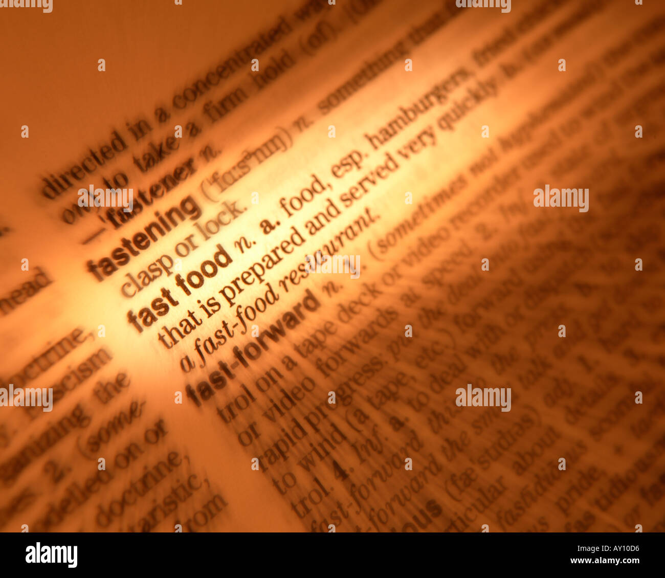 CLOSE UP OF DICTIONARY PAGE SHOWING DEFINITION OF THE WORDS FAST FOOD ...