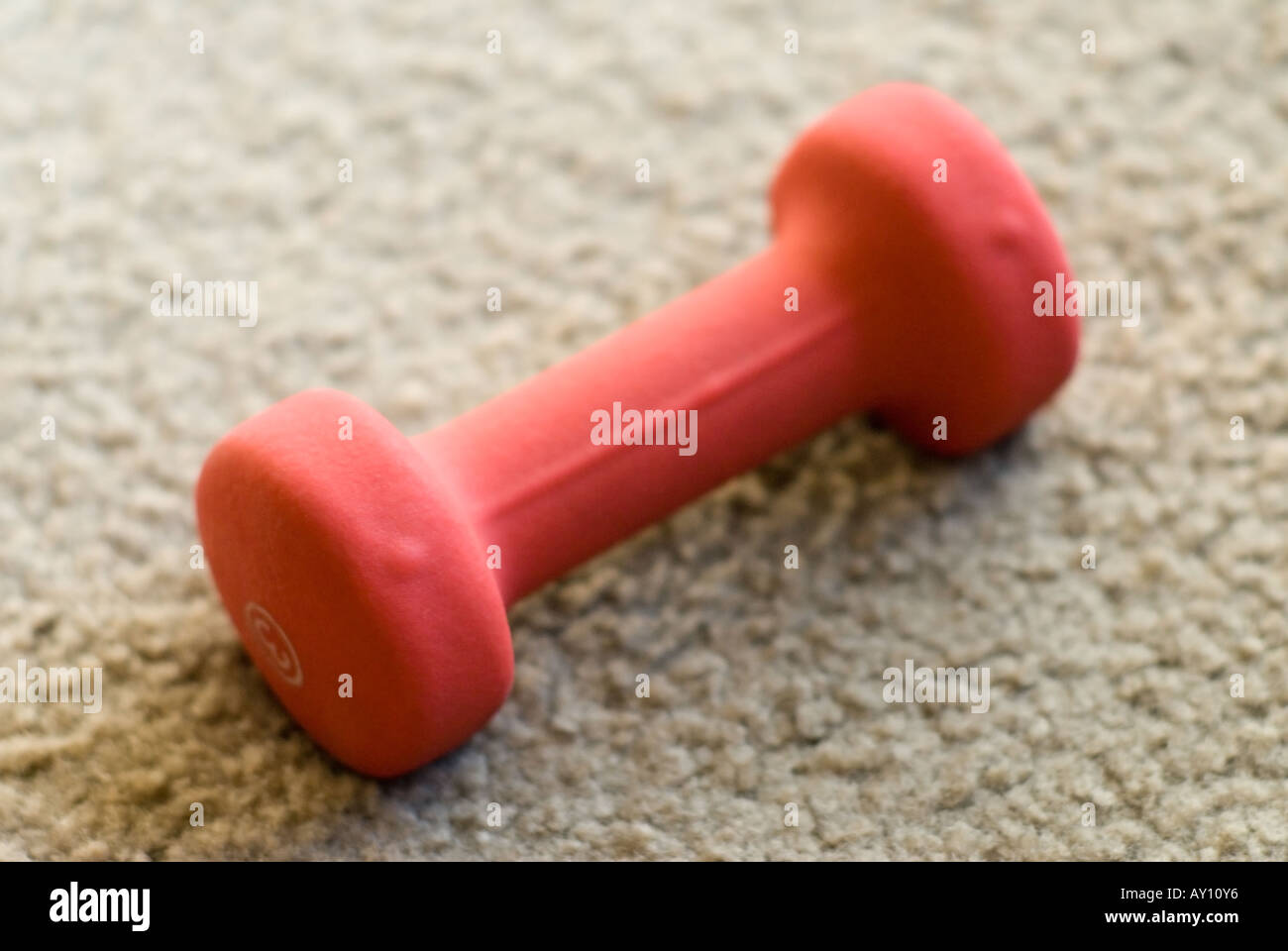 red dumb bell Stock Photo - Alamy