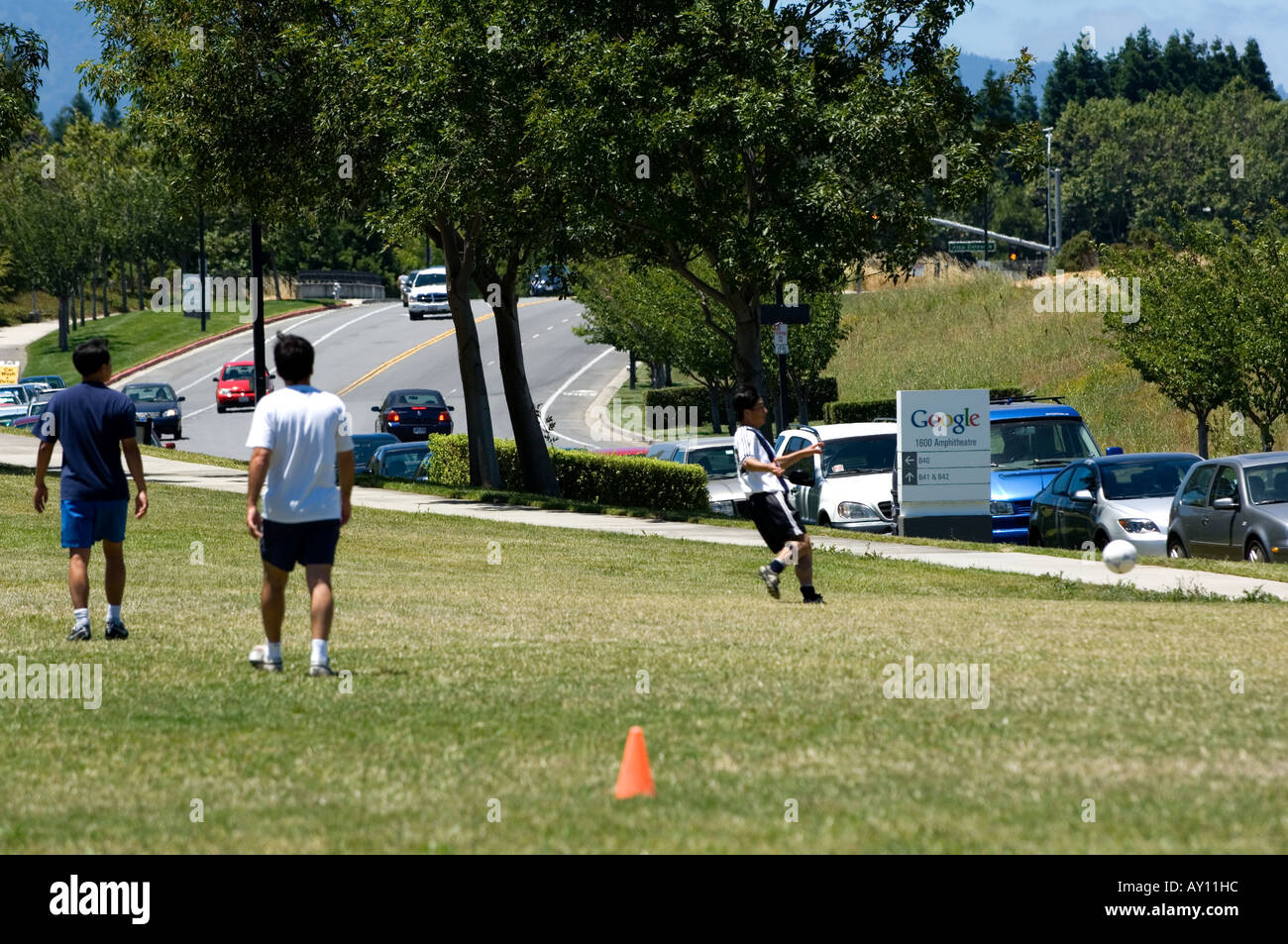 Google employees playing soccer match outside Google headquarters ...