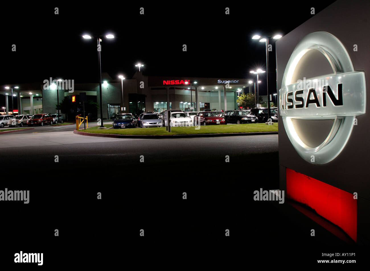 New car dealership front view at night Stock Photo - Alamy