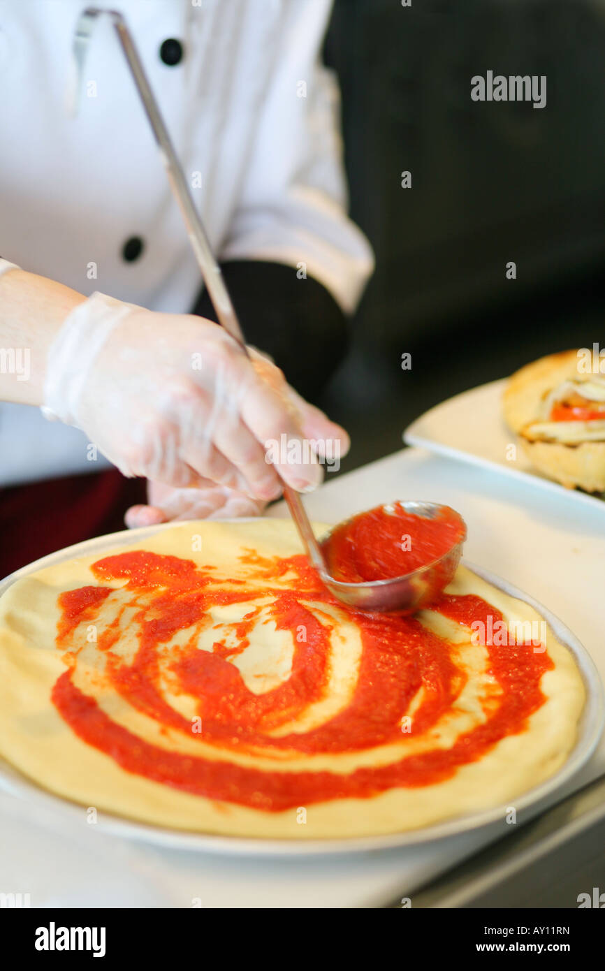 Chef making pizza Stock Photo - Alamy