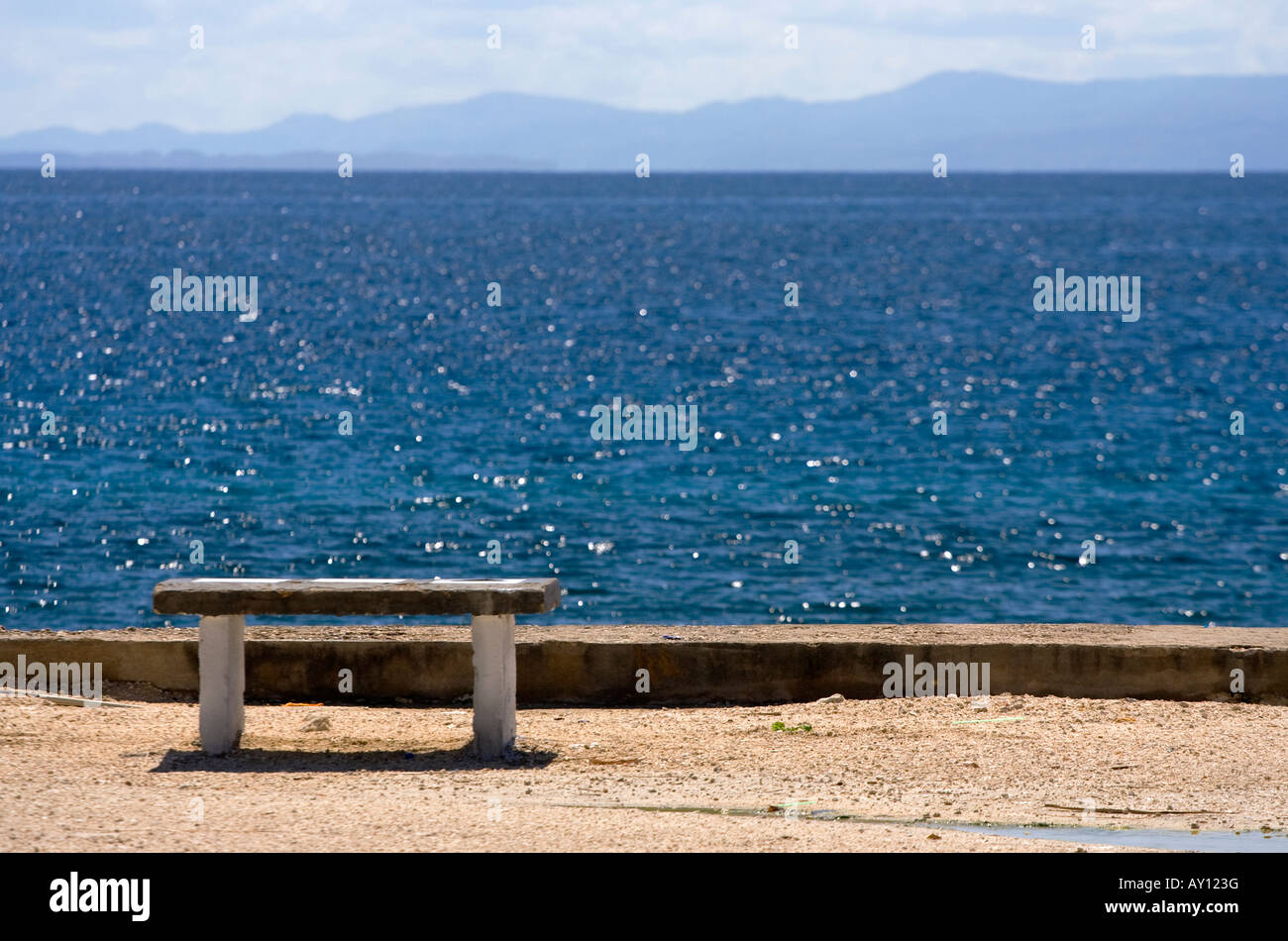 An empty bench by the sea Stock Photo - Alamy