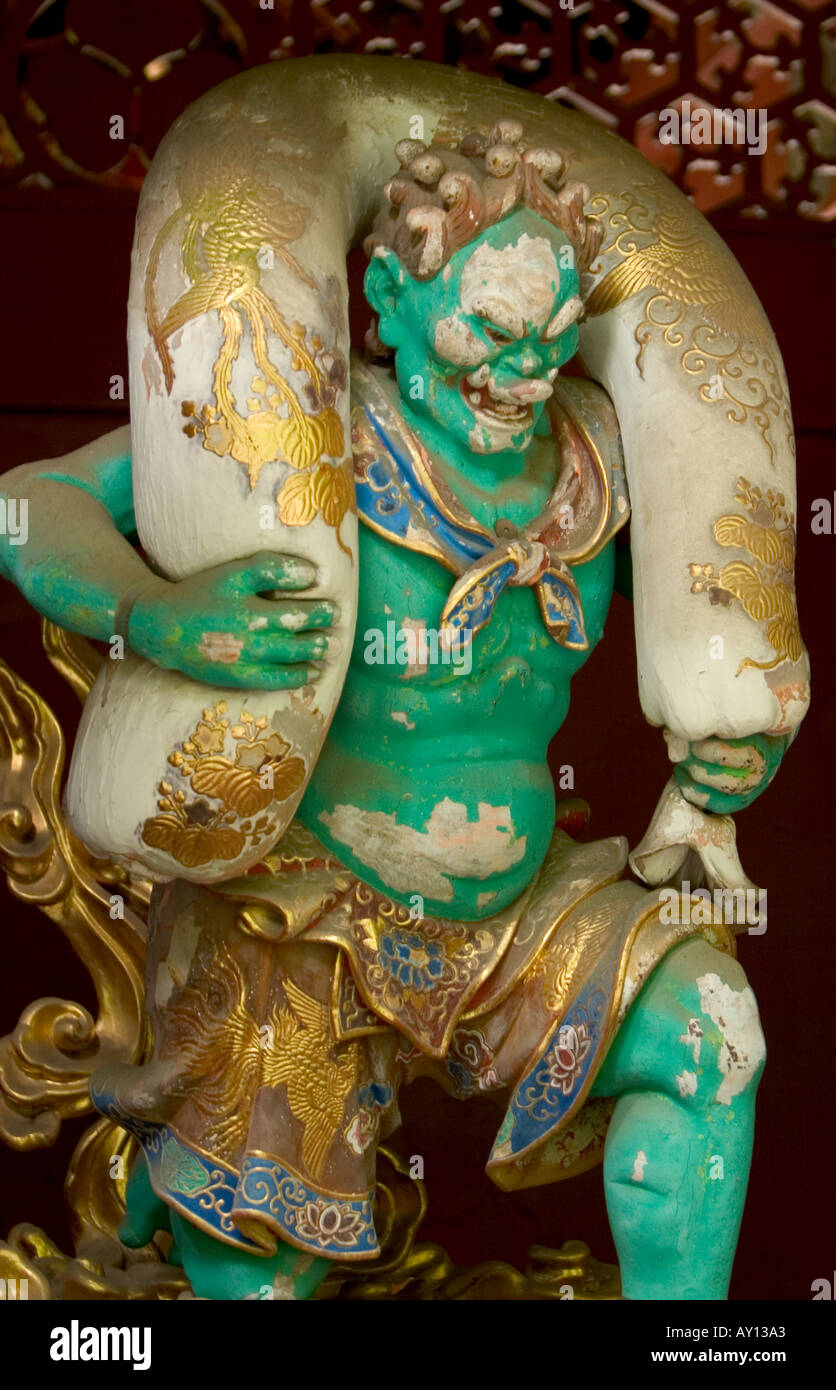 Statue of a God in Nikko Japan Stock Photo - Alamy