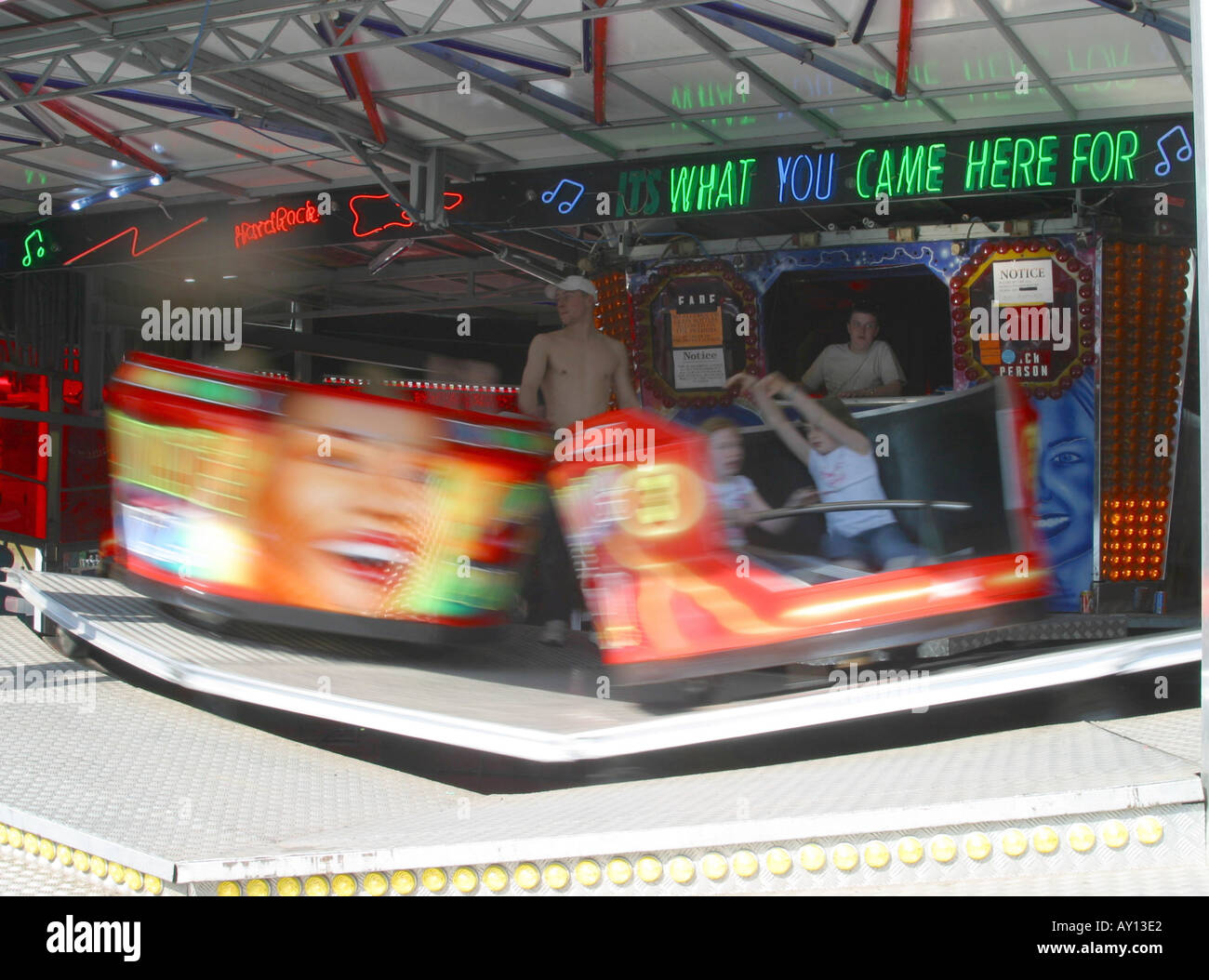 Riding the Waltzer at a fun fair Stock Photo - Alamy