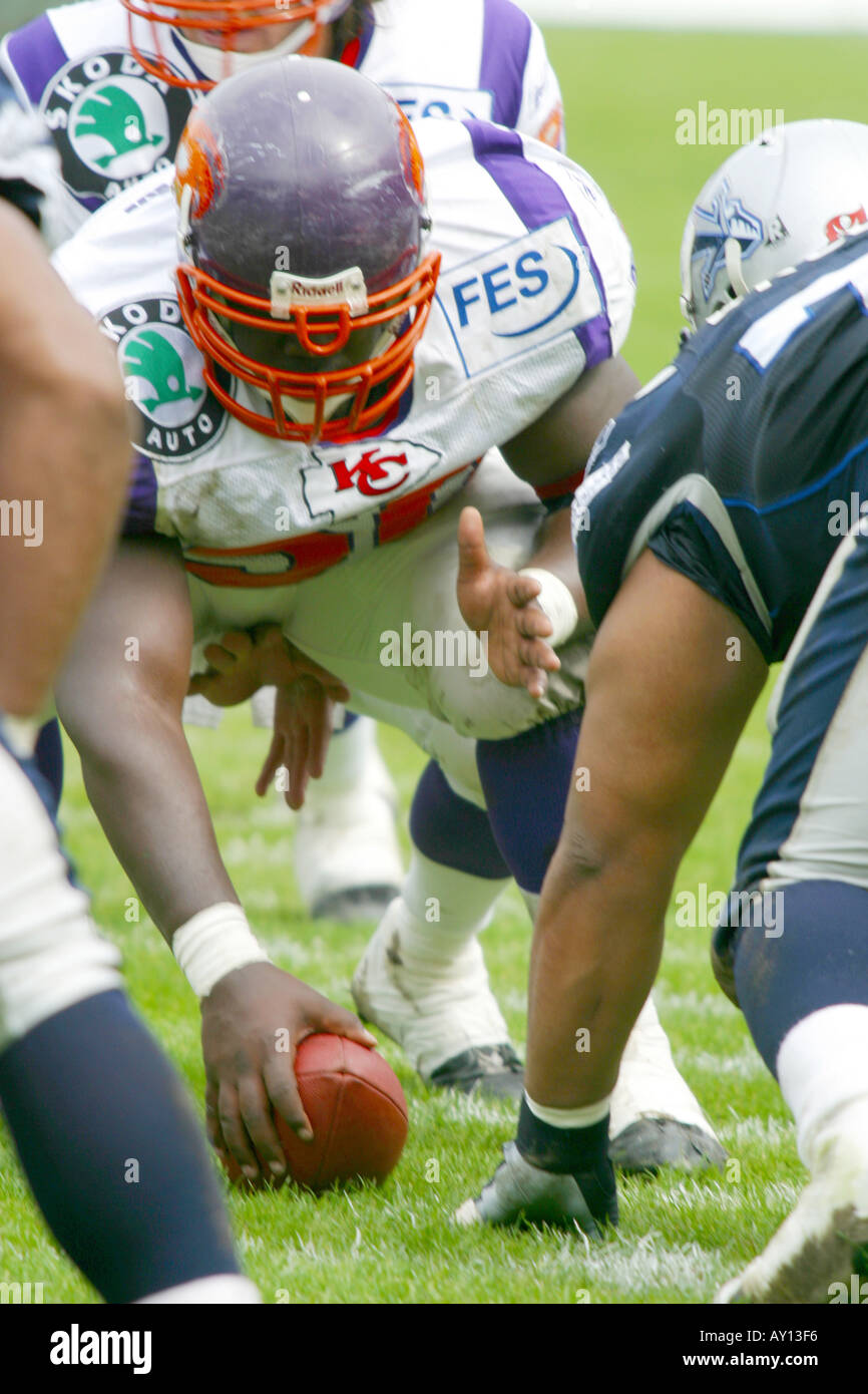 Football center snap ball hi-res stock photography and images - Alamy