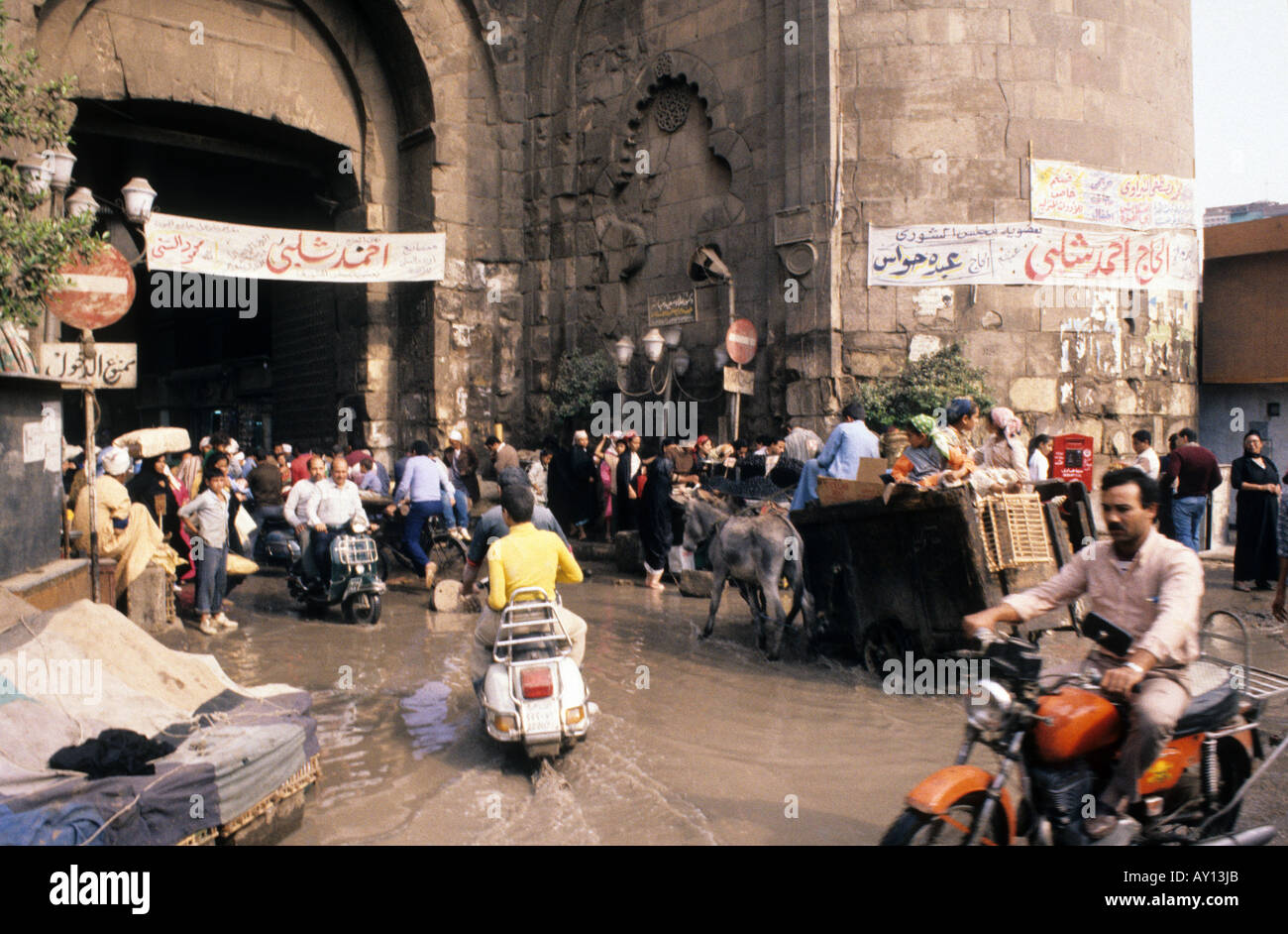 Traffic travelling through burst water-main flood, Cairo, Egypt Stock ...