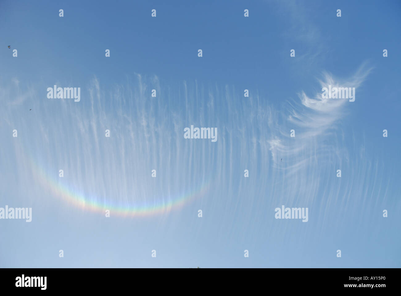 High altitude rainbow in cirrus clouds hi-res stock photography and ...