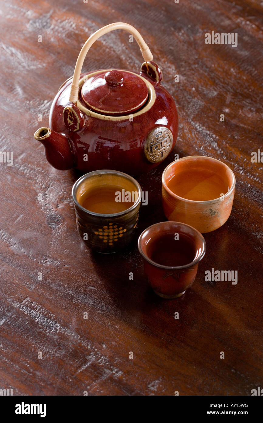 Teapot and tea cups kept on the table Stock Photo - Alamy