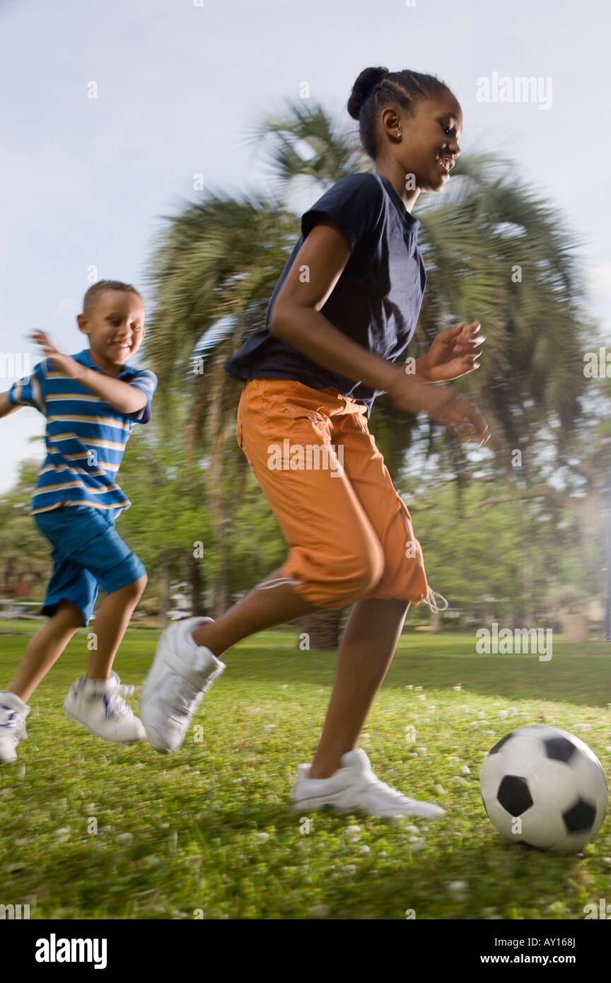 Children playing ball in park hi-res stock photography and images - Alamy