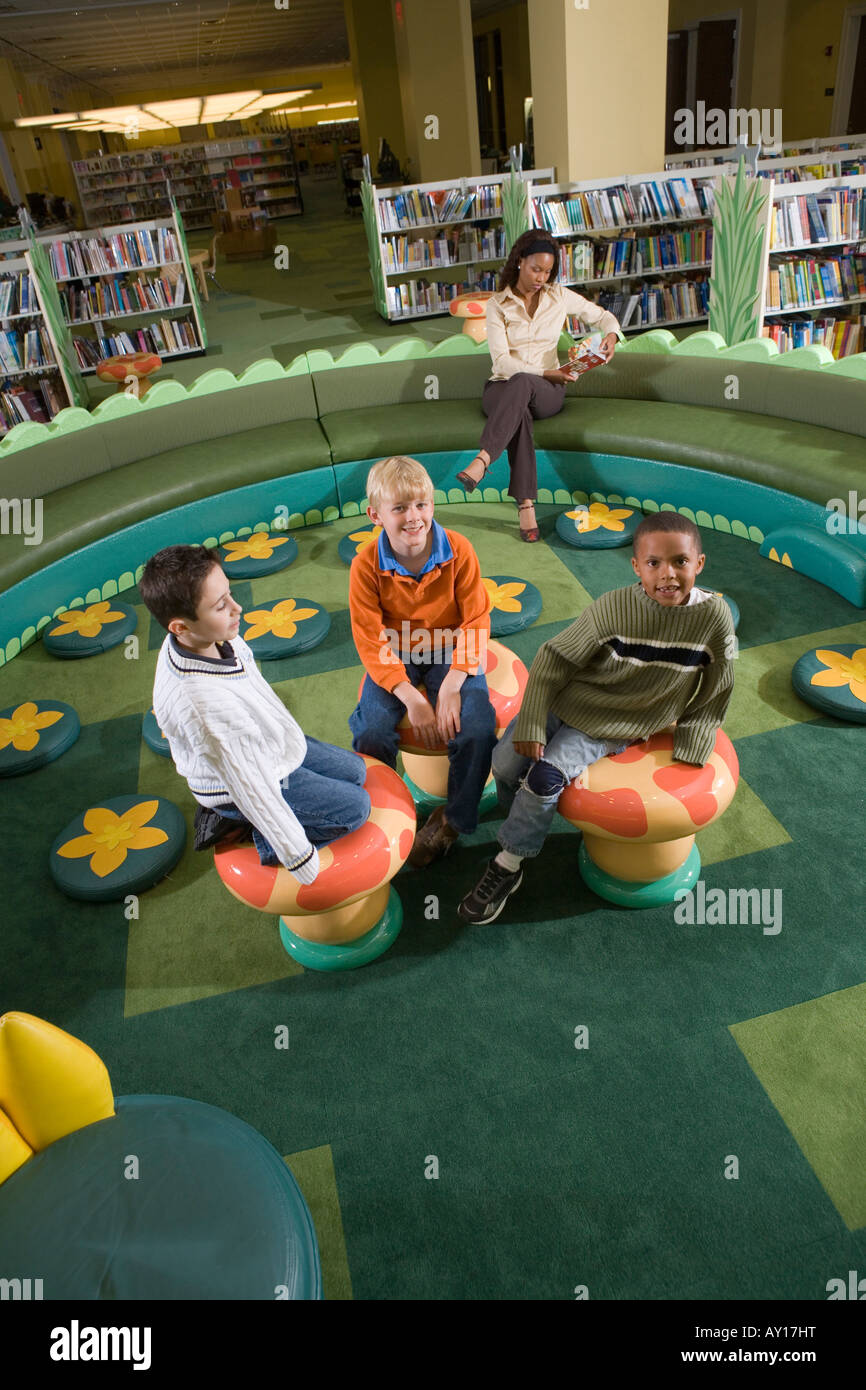 School teacher sitting on stool hi-res stock photography and images - Alamy