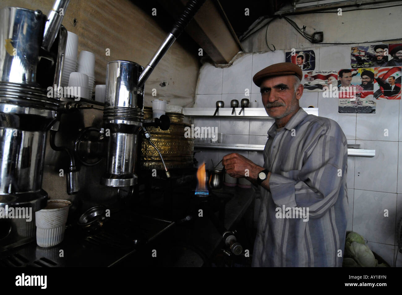 A man doing fresh delicious cafe in his small coffee shop in Aleppo ...