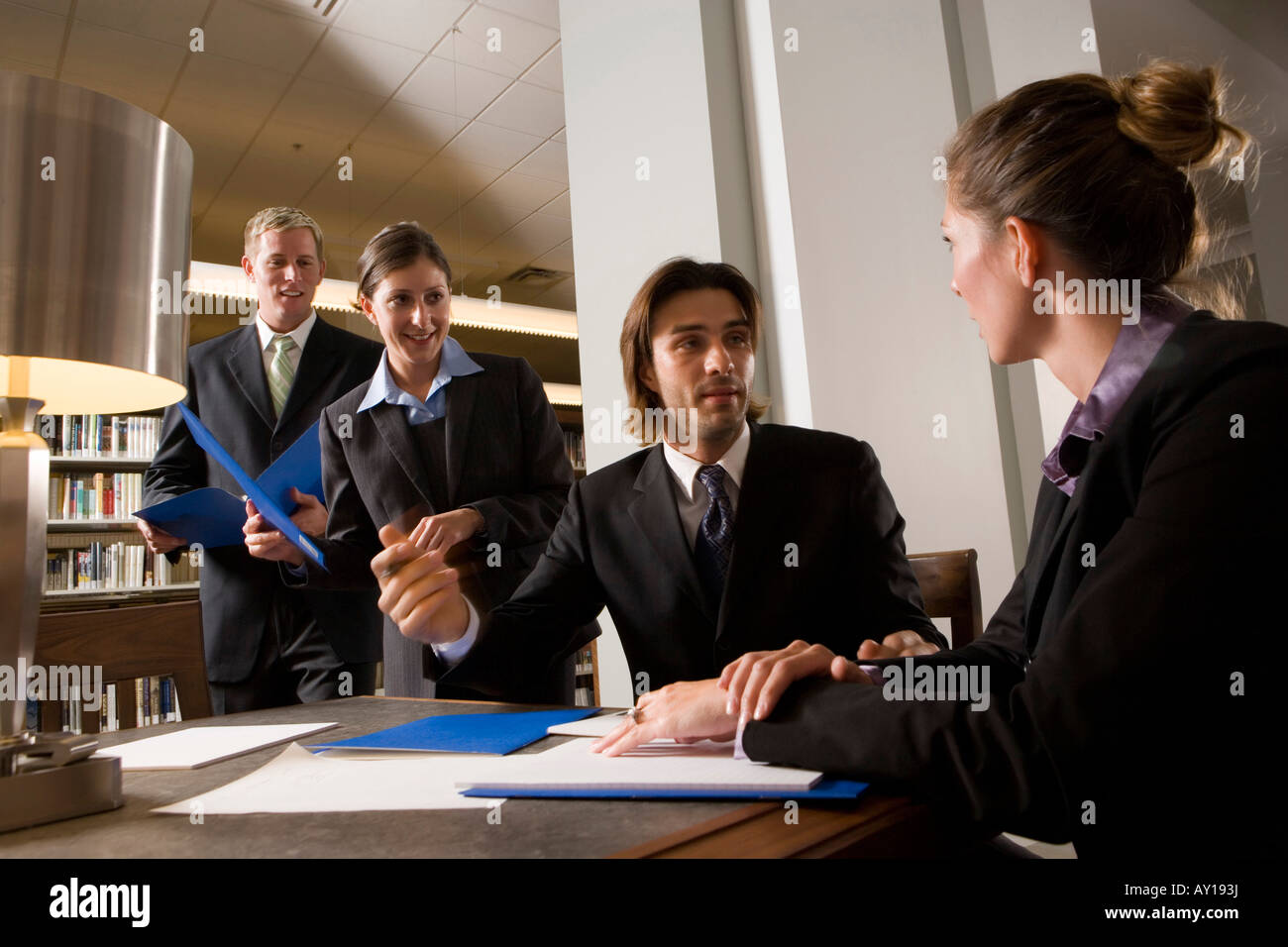 Business people discussing in an office Stock Photo - Alamy
