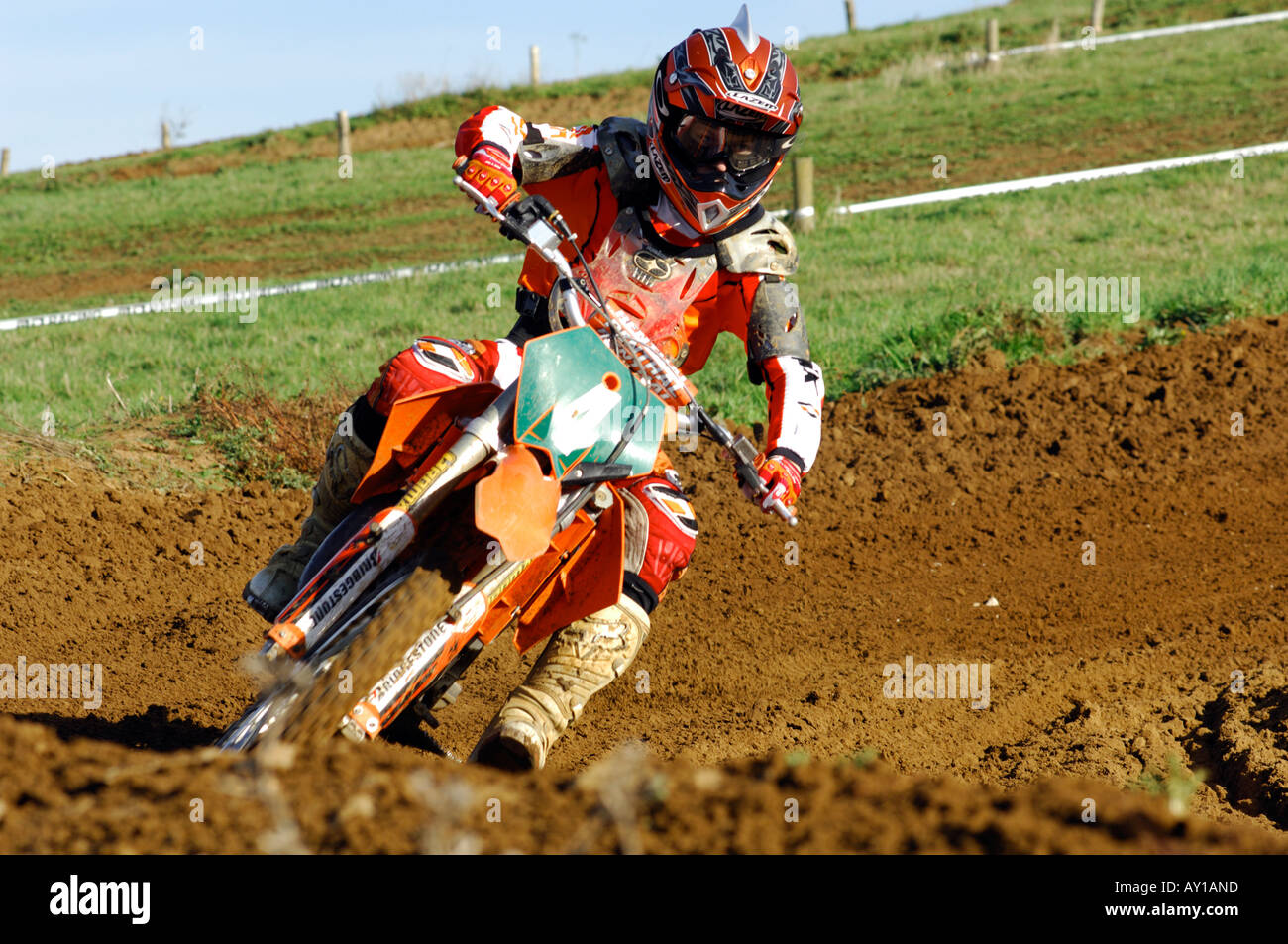 a guy rider on a motocross bile motorcycle jumping and racing big air ...