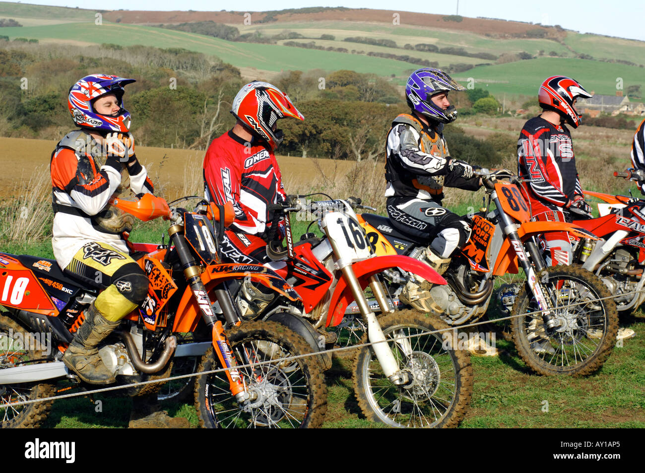 a guy rider on a motocross bile motorcycle jumping and racing big air ...